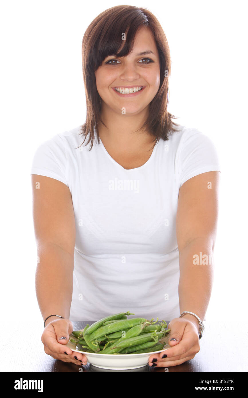 Young Woman Holding a Plate of Fresh Garden Peas Model Released Stock ...