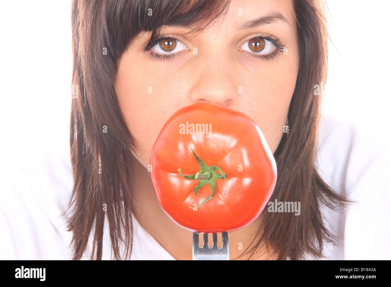 Young Woman Holding Beef Tomato Model Released Stock Photo - Alamy