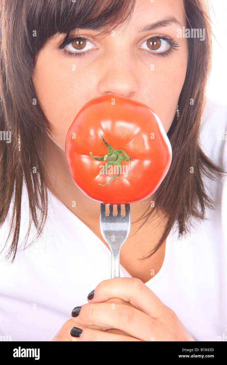 Young Woman Holding Beef Tomato Model Released Stock Photo - Alamy