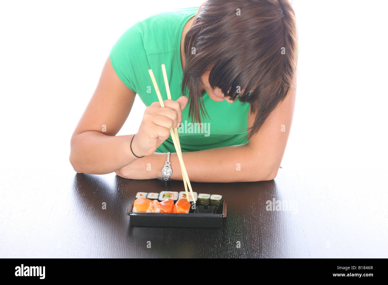 Young Woman with Sushi Model Released Stock Photo - Alamy