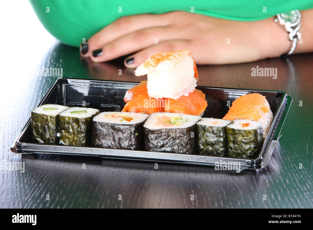 Young Woman with Sushi Model Released Stock Photo - Alamy