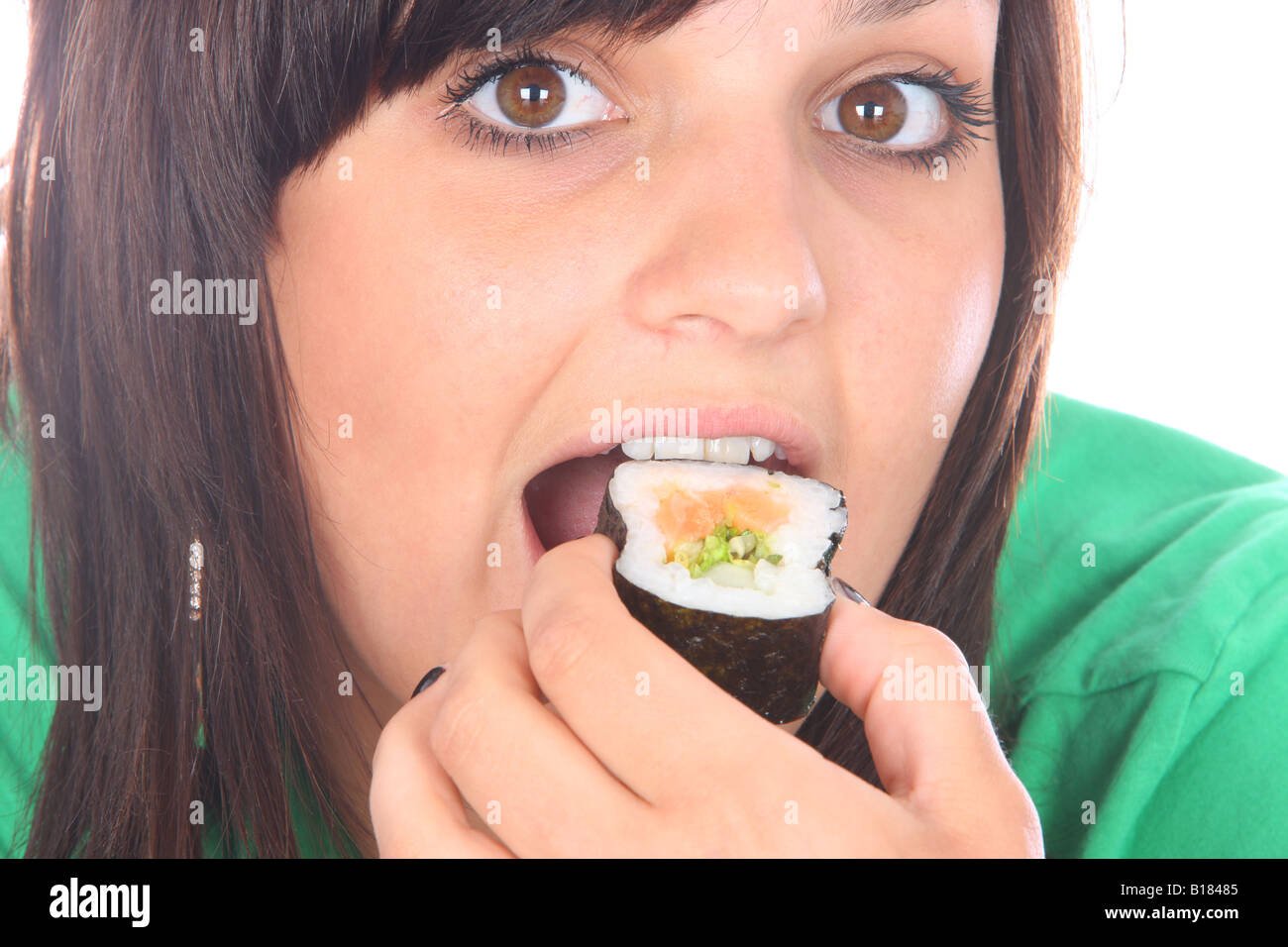 Young Woman Eating Sushi Model Released Stock Photo - Alamy