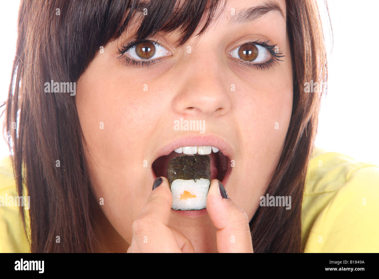 Young Woman Eating Sushi Model Released Stock Photo - Alamy