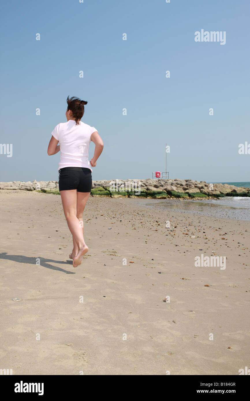 Young Woman Running Model Released Stock Photo - Alamy