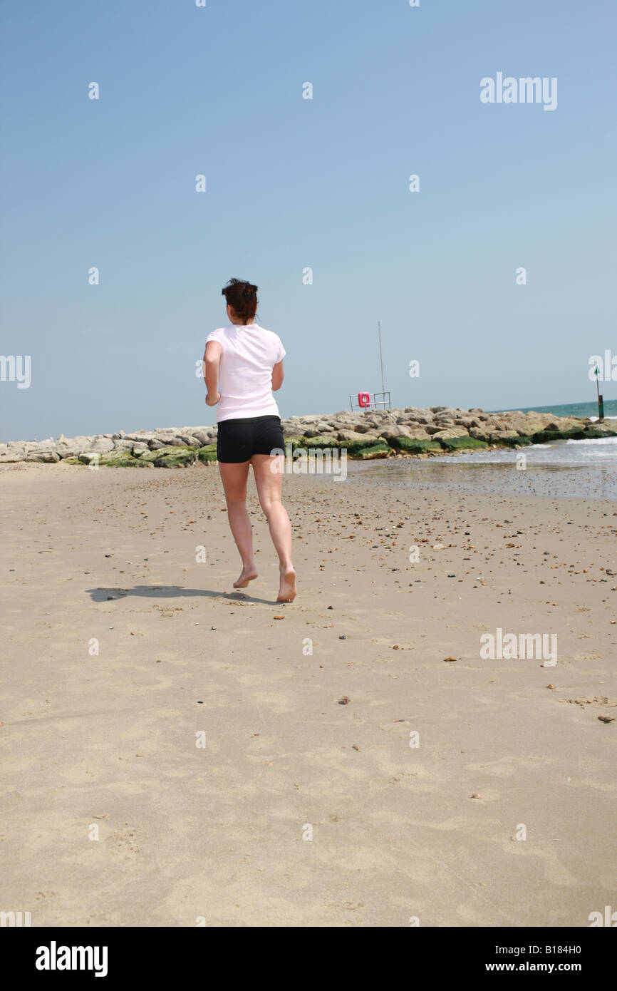 Young Woman Running Model Released Stock Photo - Alamy