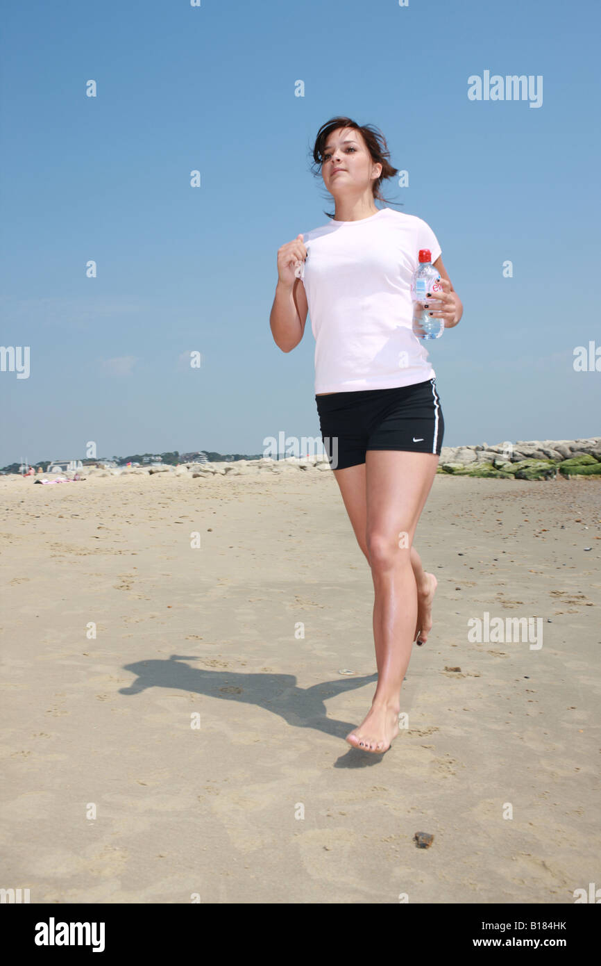 Young Woman Running Model Released Stock Photo - Alamy
