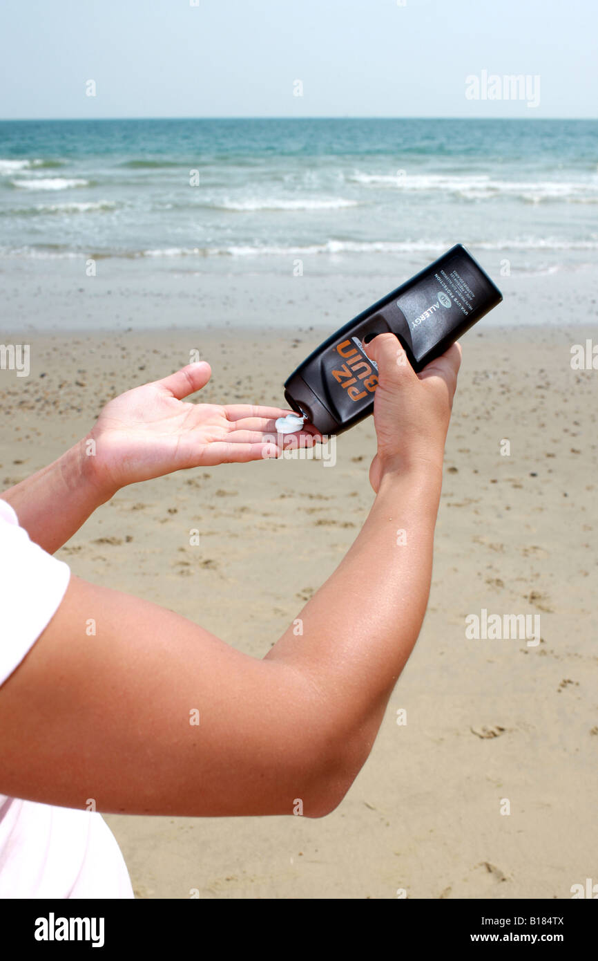 Young Woman Applying Suncream Model Released Stock Photo - Alamy
