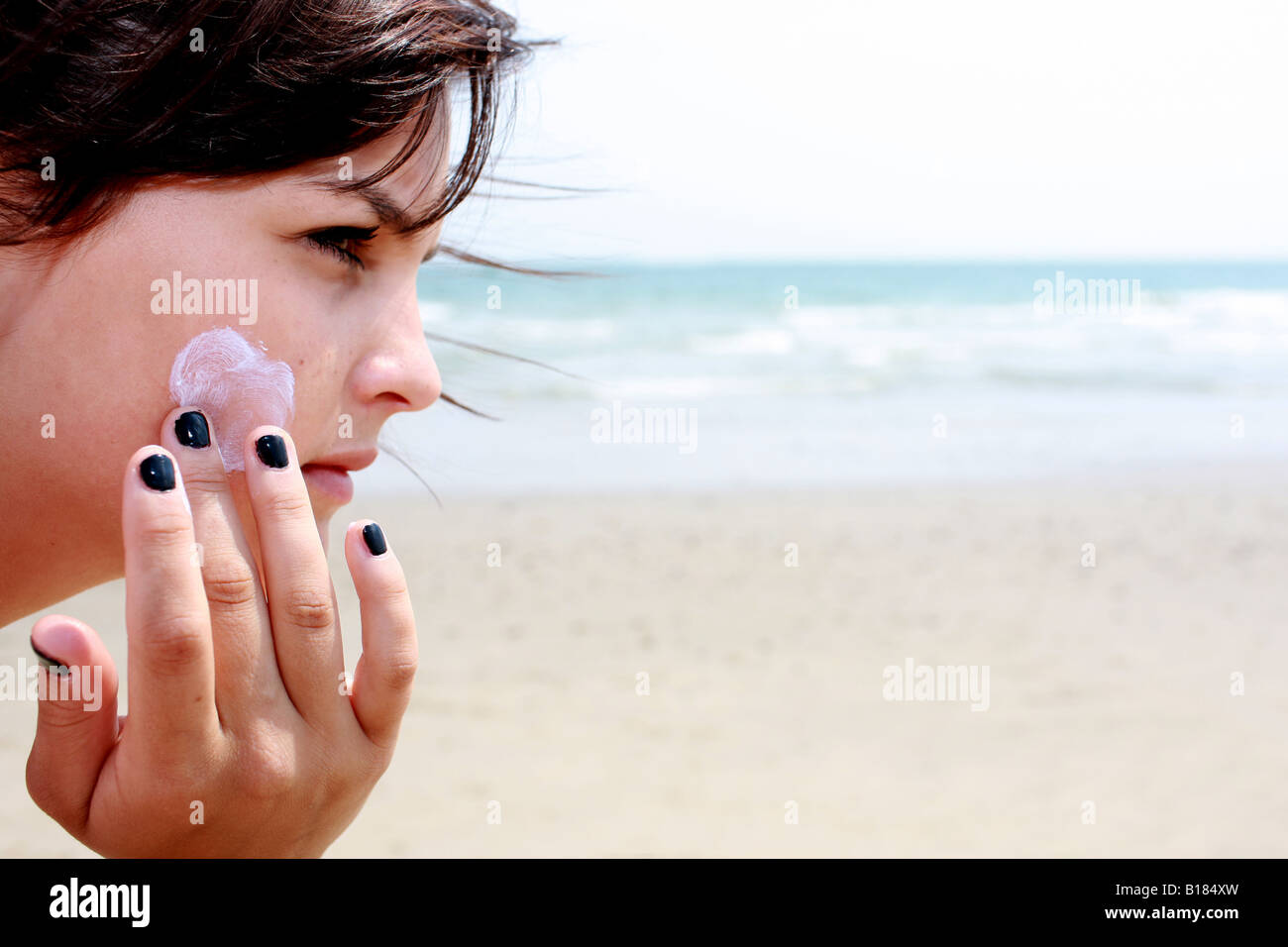 Young Woman Applying Suncream Model Released Stock Photo - Alamy