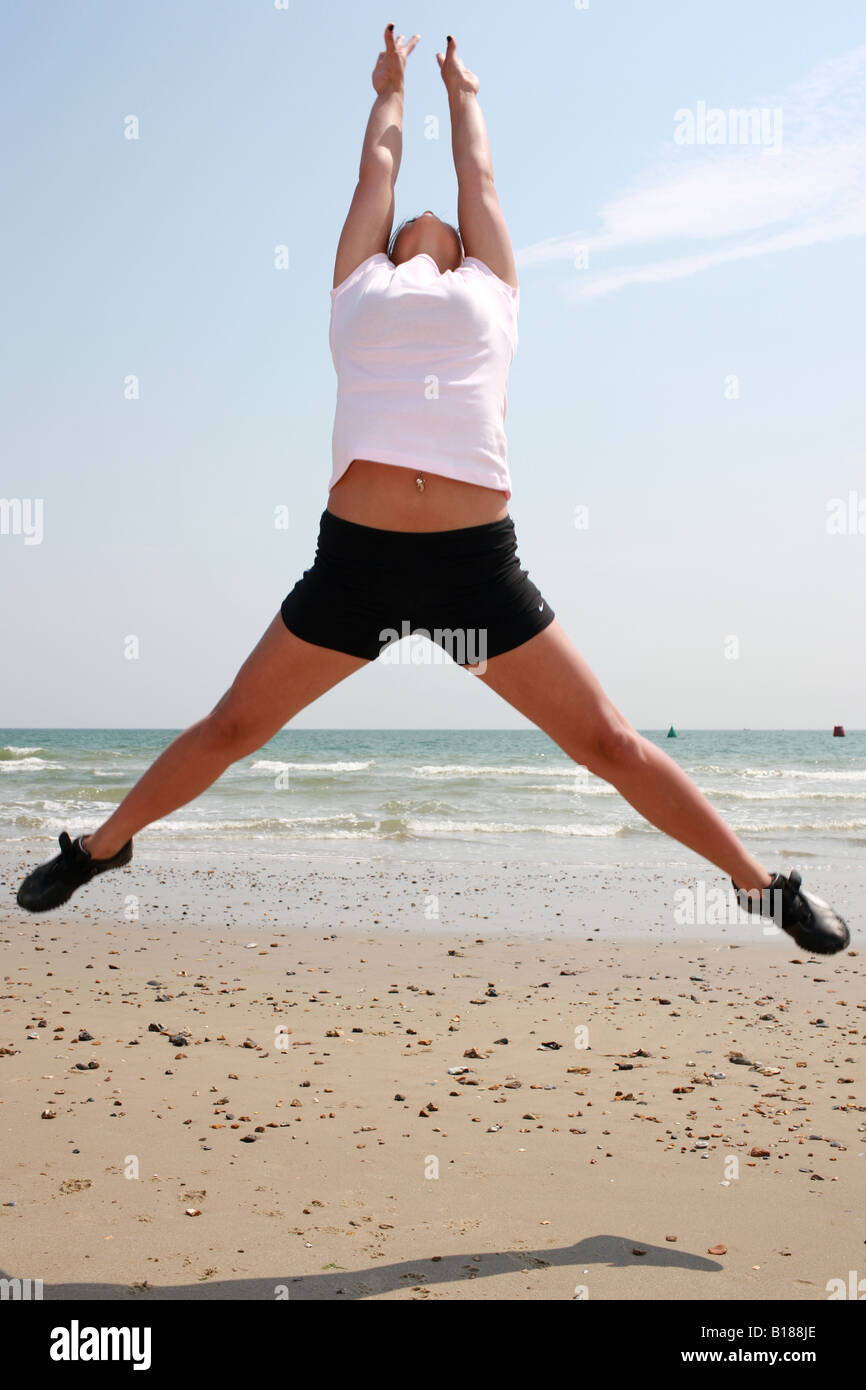 Young Woman Jumping Model Released Stock Photo - Alamy