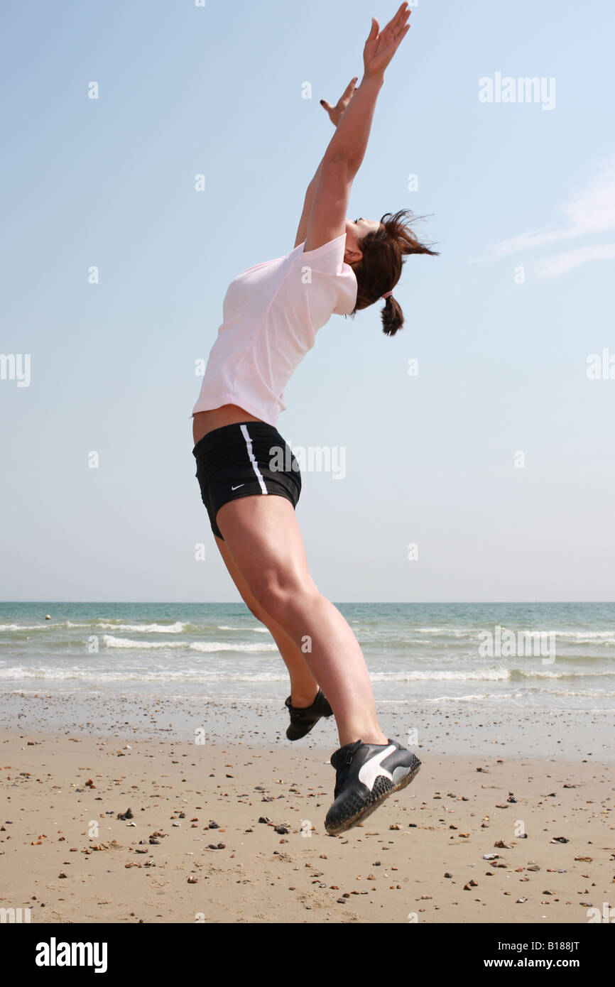 Young Woman Jumping Model Released Stock Photo - Alamy