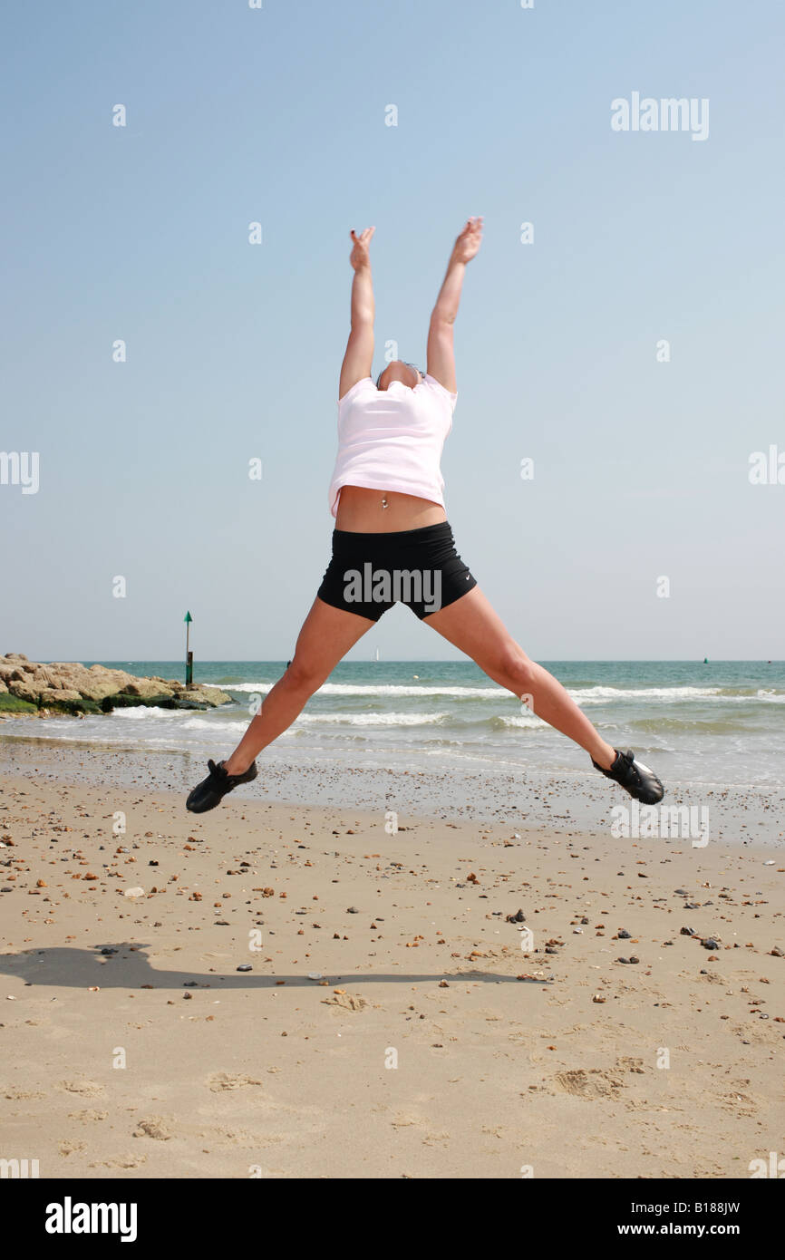 Young Woman Jumping Model Released Stock Photo - Alamy