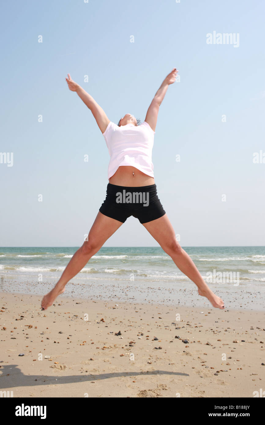 Young Woman Jumping Model Released Stock Photo - Alamy