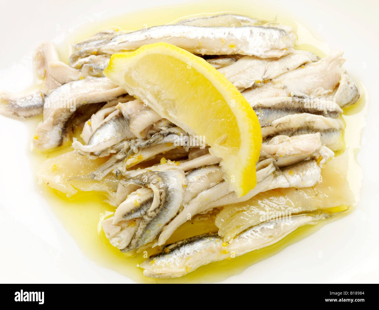 Fresh Tasty Marinated Anchovies Fish Fillets Served On A Plate Isolated ...