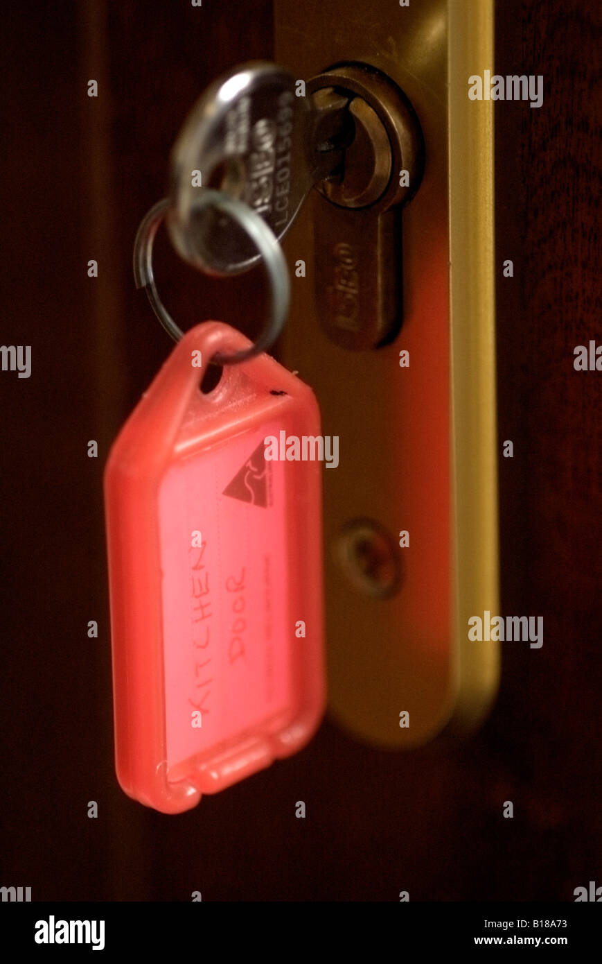 kitchen door key in lock Stock Photo - Alamy