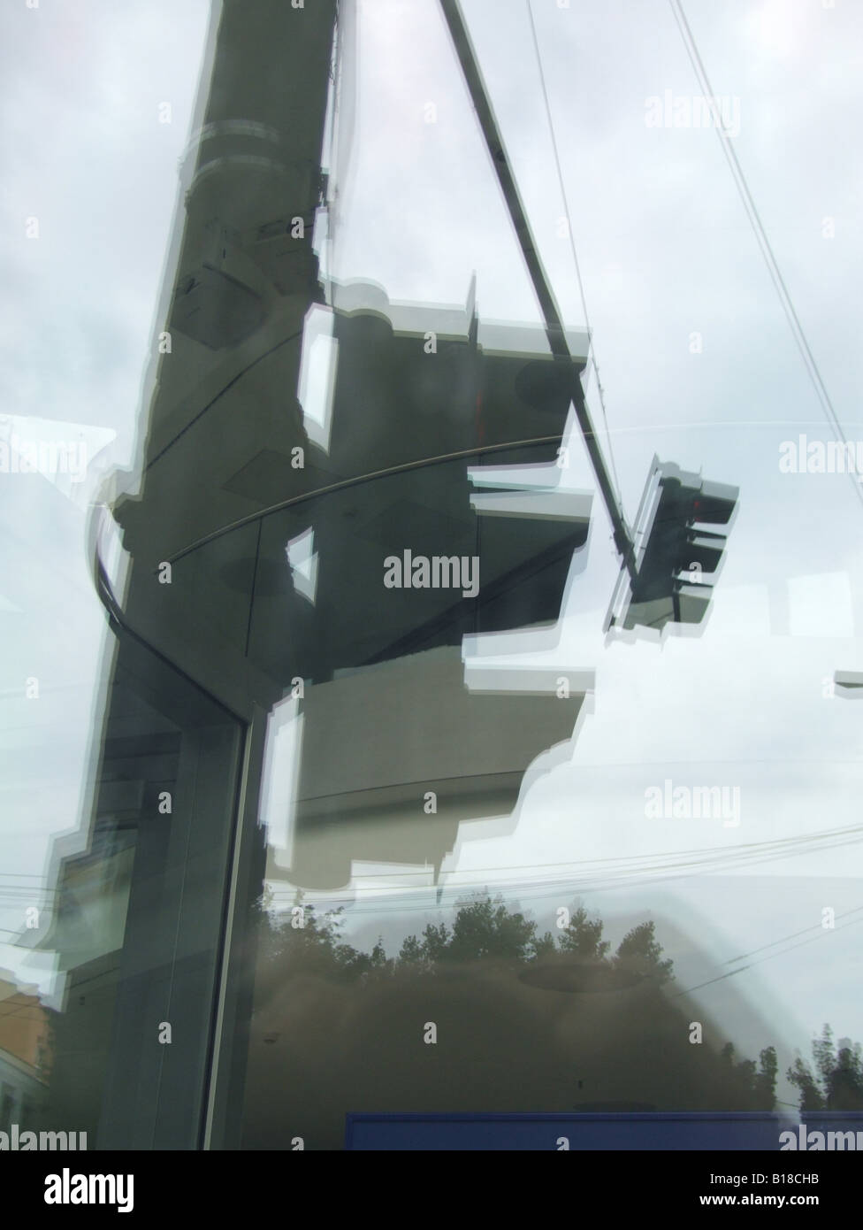 traffic lights reflection in window in city town Stock Photo - Alamy