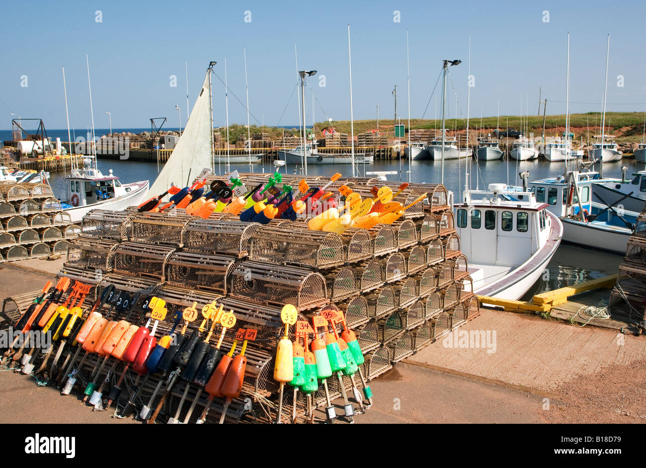 Fishing boats and Lobster traps, Seacow Pond, Prince Edward Island ...