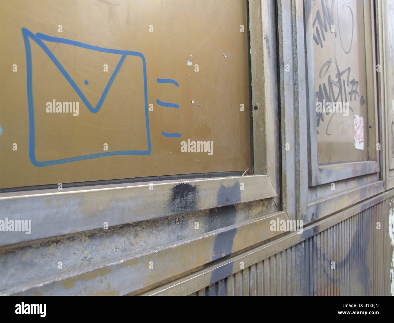 one letter envelope designed on wall in town Stock Photo - Alamy