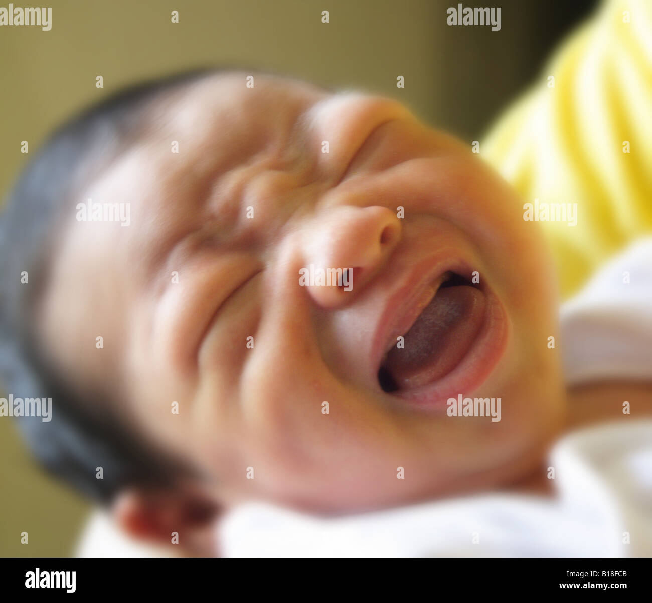 Baby crying facial expression Stock Photo - Alamy