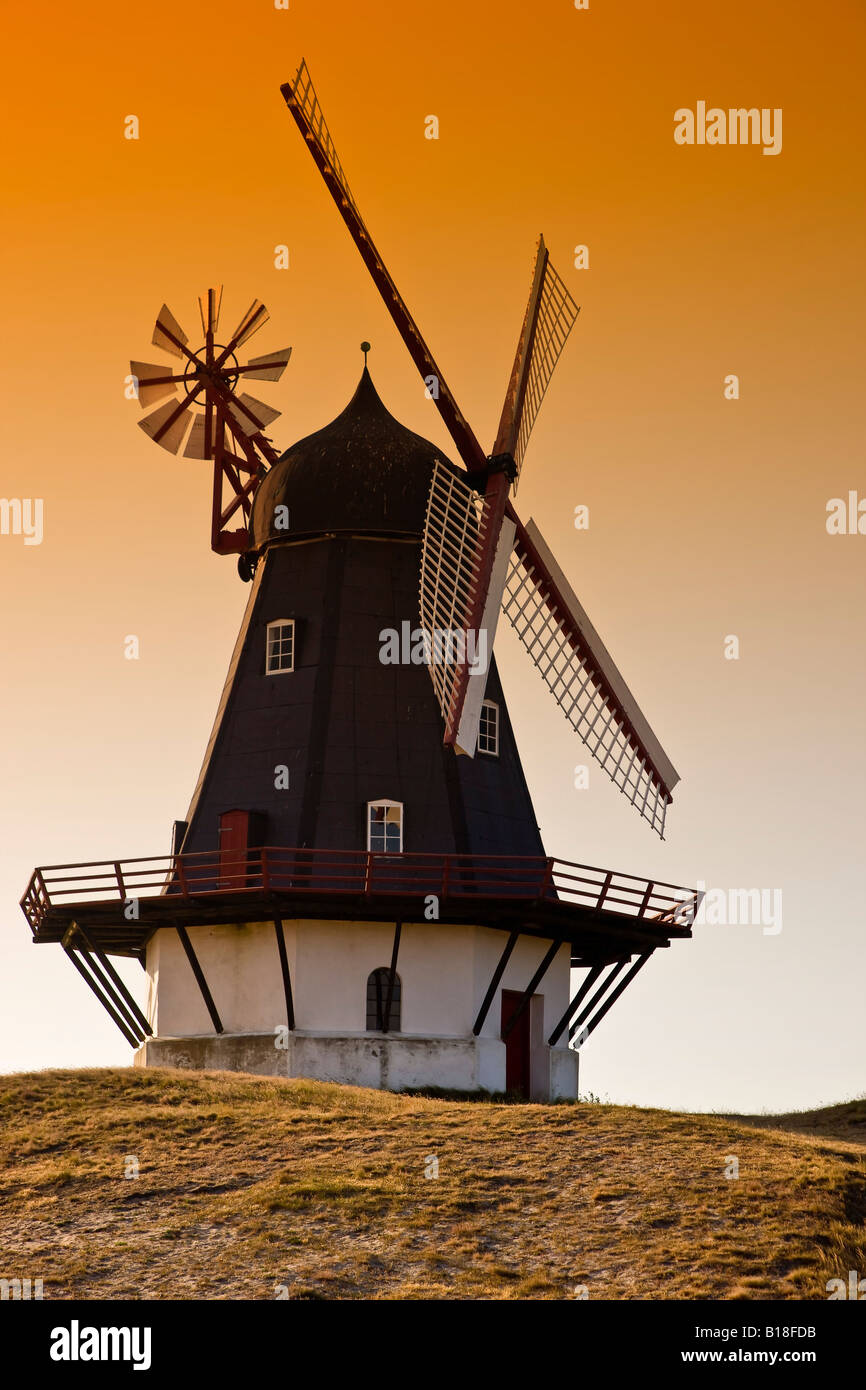 The old windmill at Soenderho in sunset Stock Photo - Alamy
