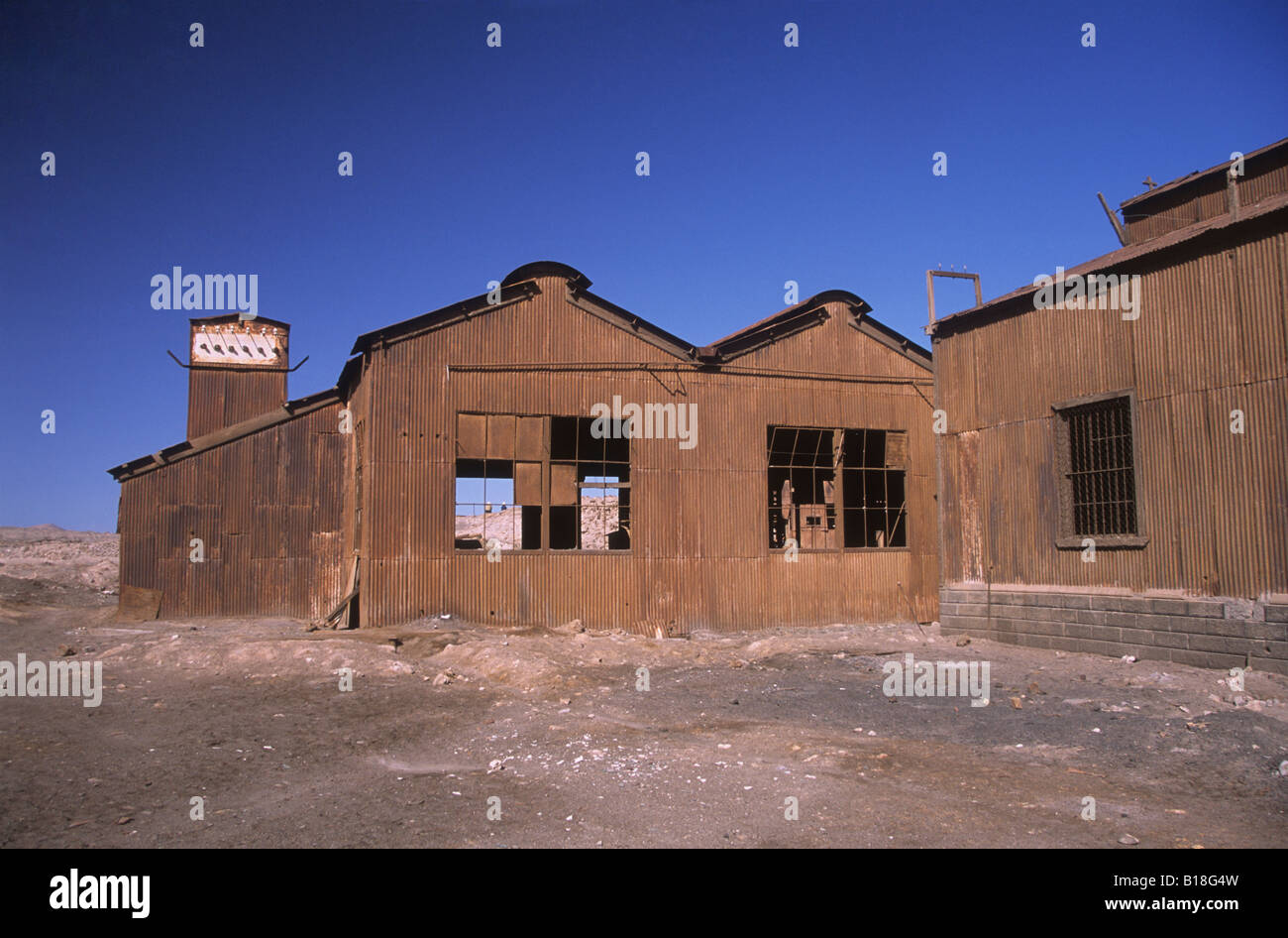 Rusting corrugated iron building in abandoned mining town of Santa ...