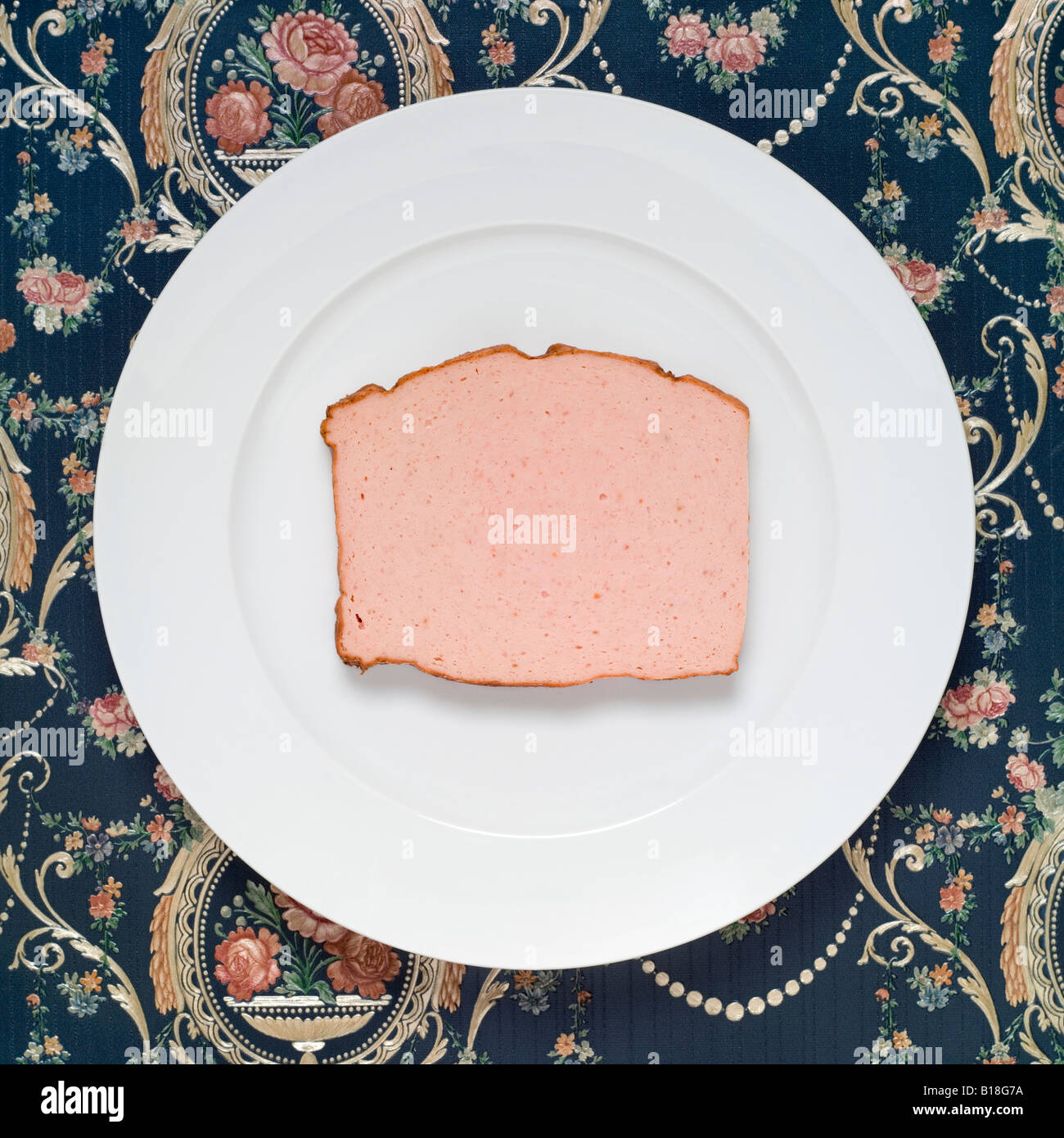 Slice of meat loaf on plate, elevated view Stock Photo - Alamy