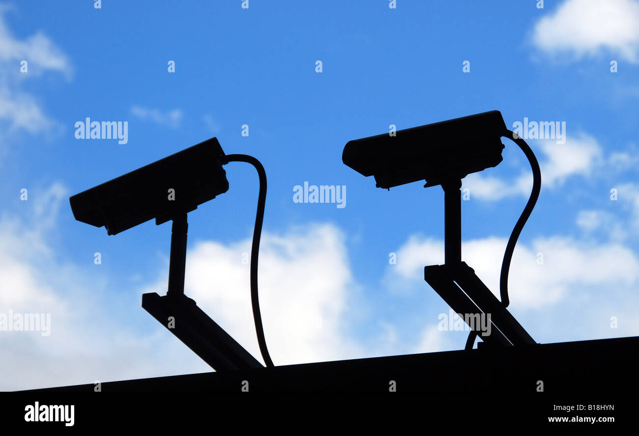 CCTV cameras with blue sky background Stock Photo - Alamy
