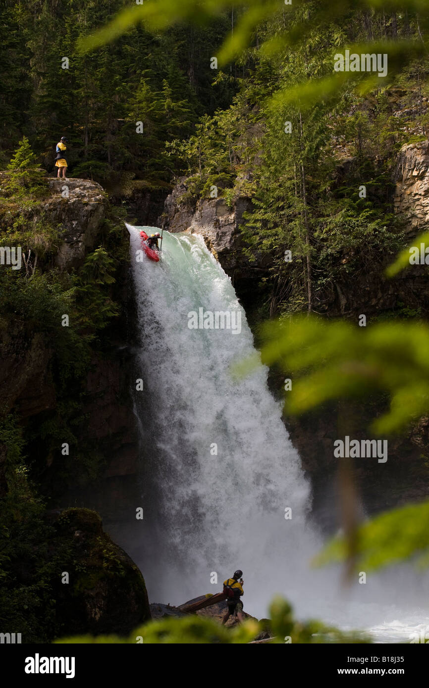 A kayaker running the 60 foot Sutherland Falls, Revelstoke, British ...