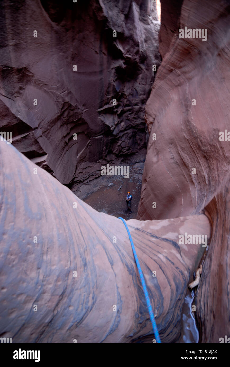 Person rapelling into cave hi-res stock photography and images - Alamy