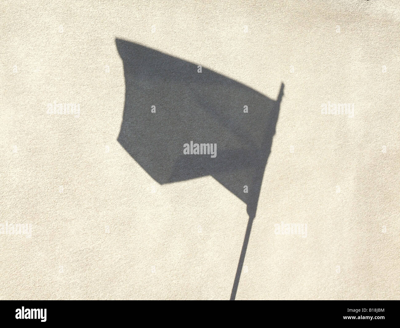 flying flag banner shadow on white wall Stock Photo - Alamy