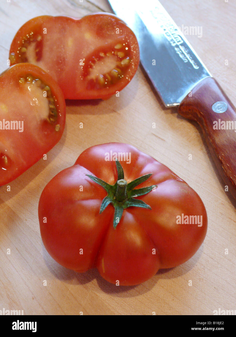 Five fresh tomatoes hi-res stock photography and images - Alamy
