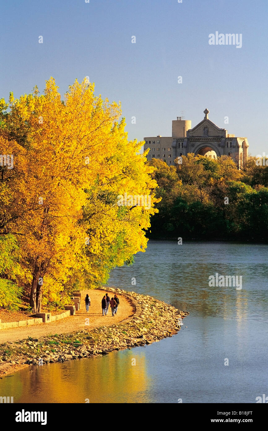 walkway along the Red River with St. Boniface in the background ...