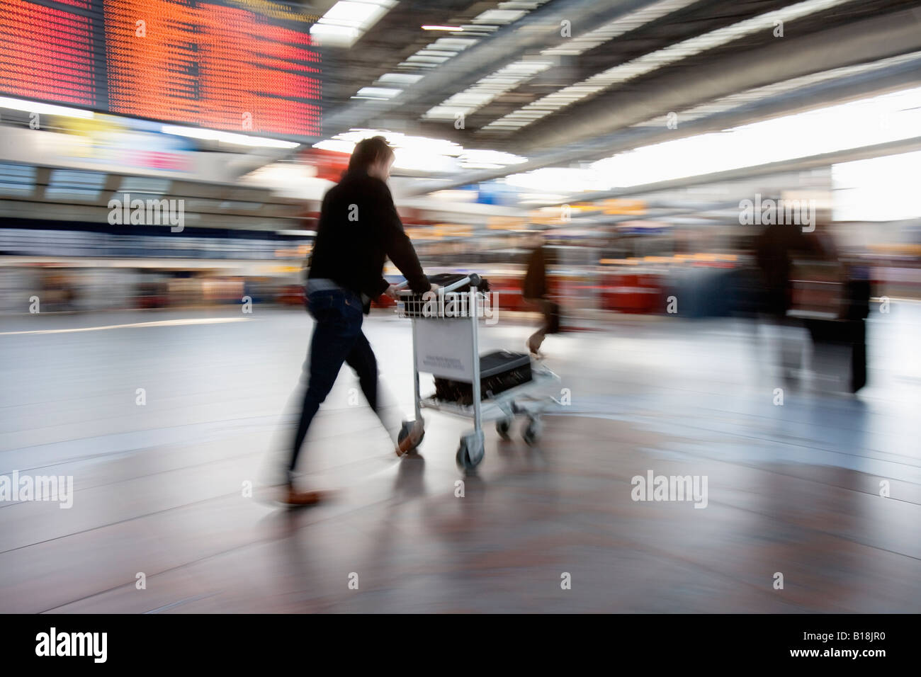 Man running airport late hi-res stock photography and images - Alamy