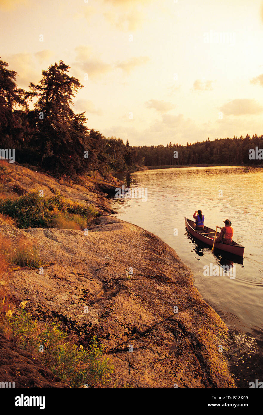 couple canoeing, Big Whiteshell Lake, Whiteshell Provincial Park ...