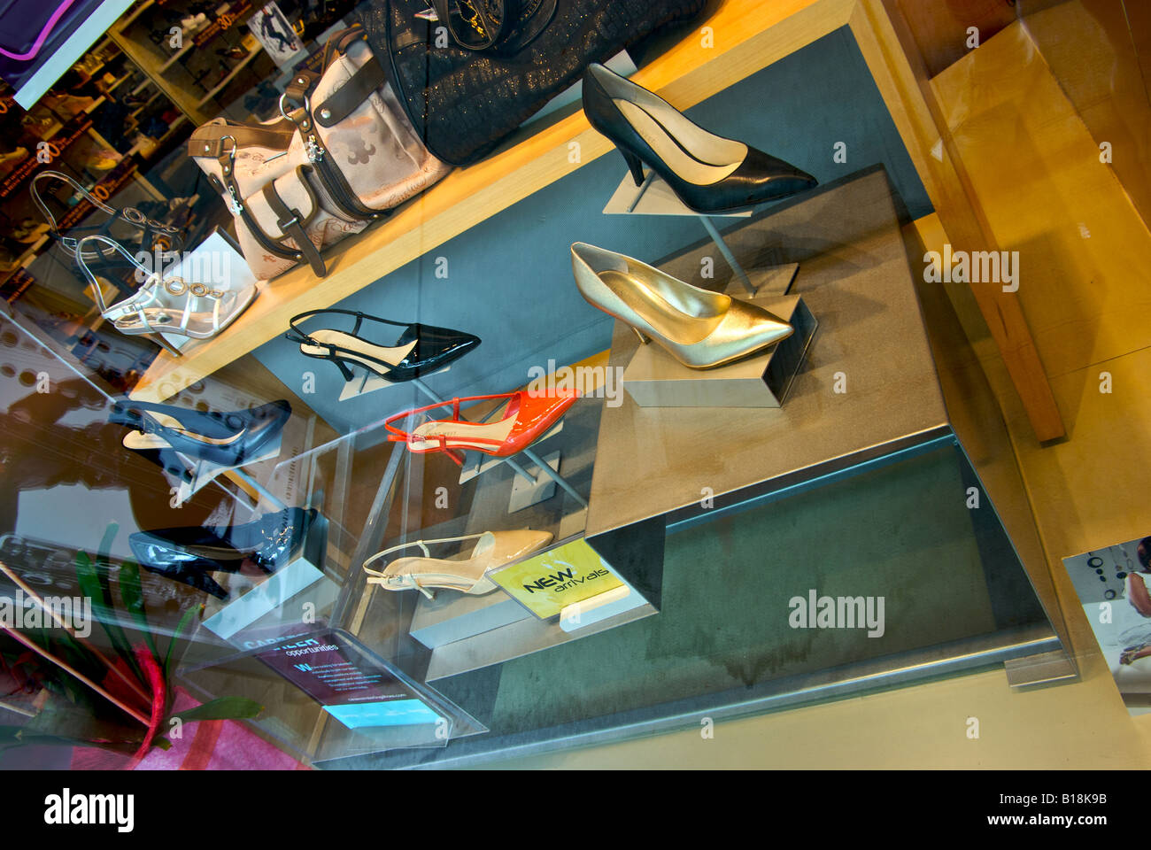 High end women's shoe and leather goods store window display Stock ...