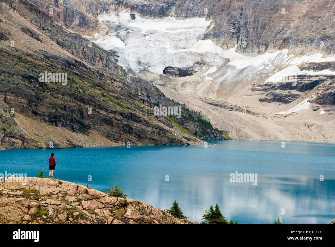 A woman overlooks Lake McArthur in the Lake Ohara Region of Yoho ...