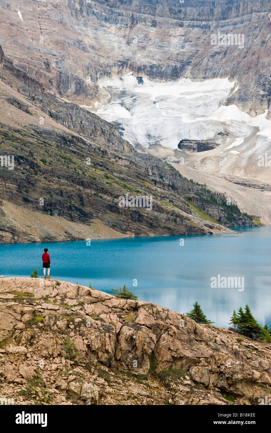 A woman overlooks Lake McArthur in the Lake Ohara Region of Yoho ...