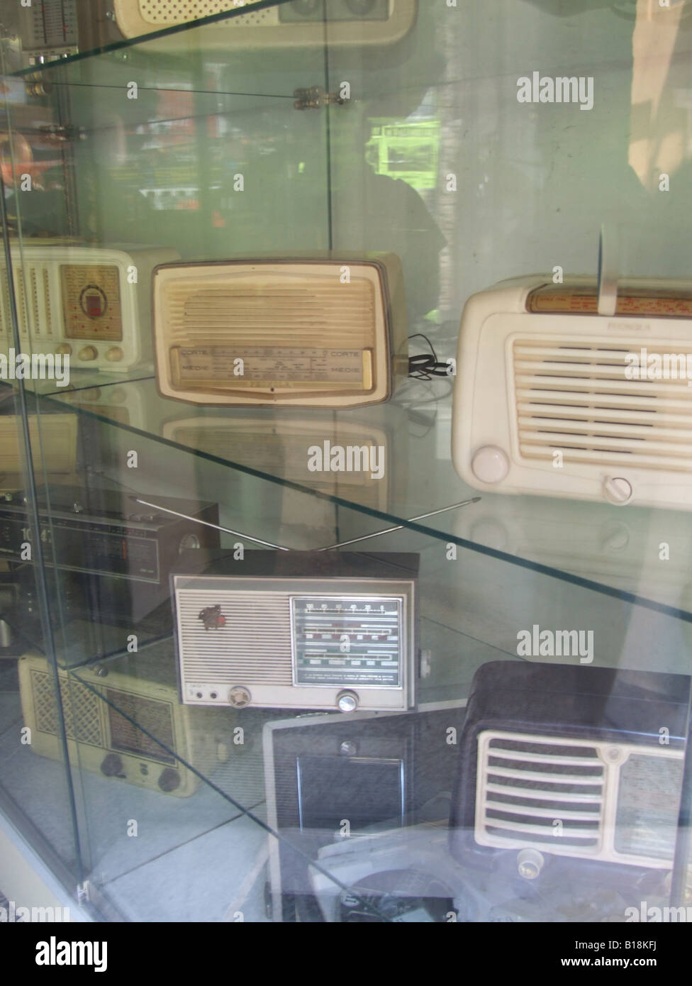 selection of old radios in shop window Stock Photo - Alamy
