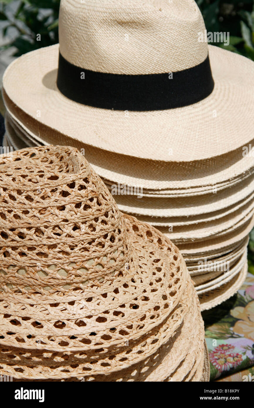 selection of straw hats on outdoor market stall Stock Photo - Alamy