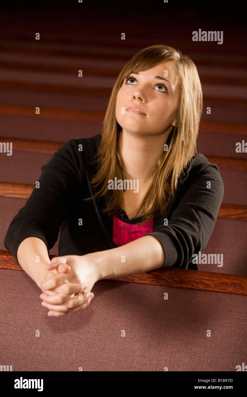 Girl praying church hi-res stock photography and images - Alamy