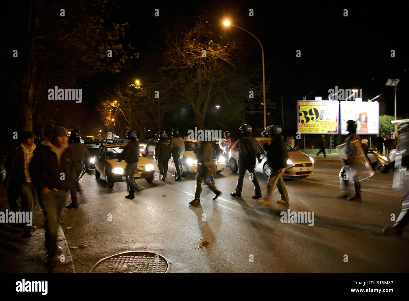 Italian riot police with plastic shields blocking traffic during ...