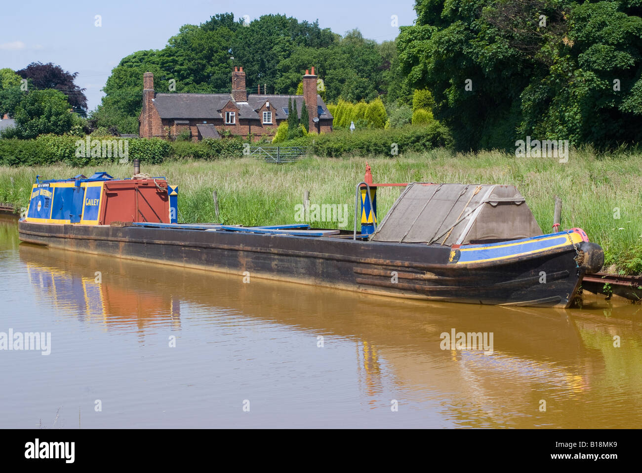 A British Waterways Working Narrow Boat on the Trent and Mersey Canal ...