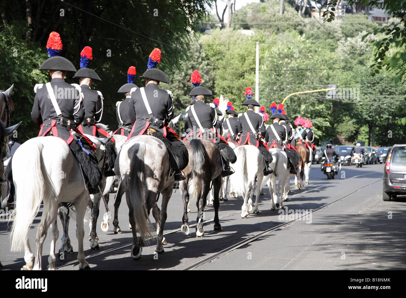 troop of mounted Carabinieri police in ceremonial uniform riding ...
