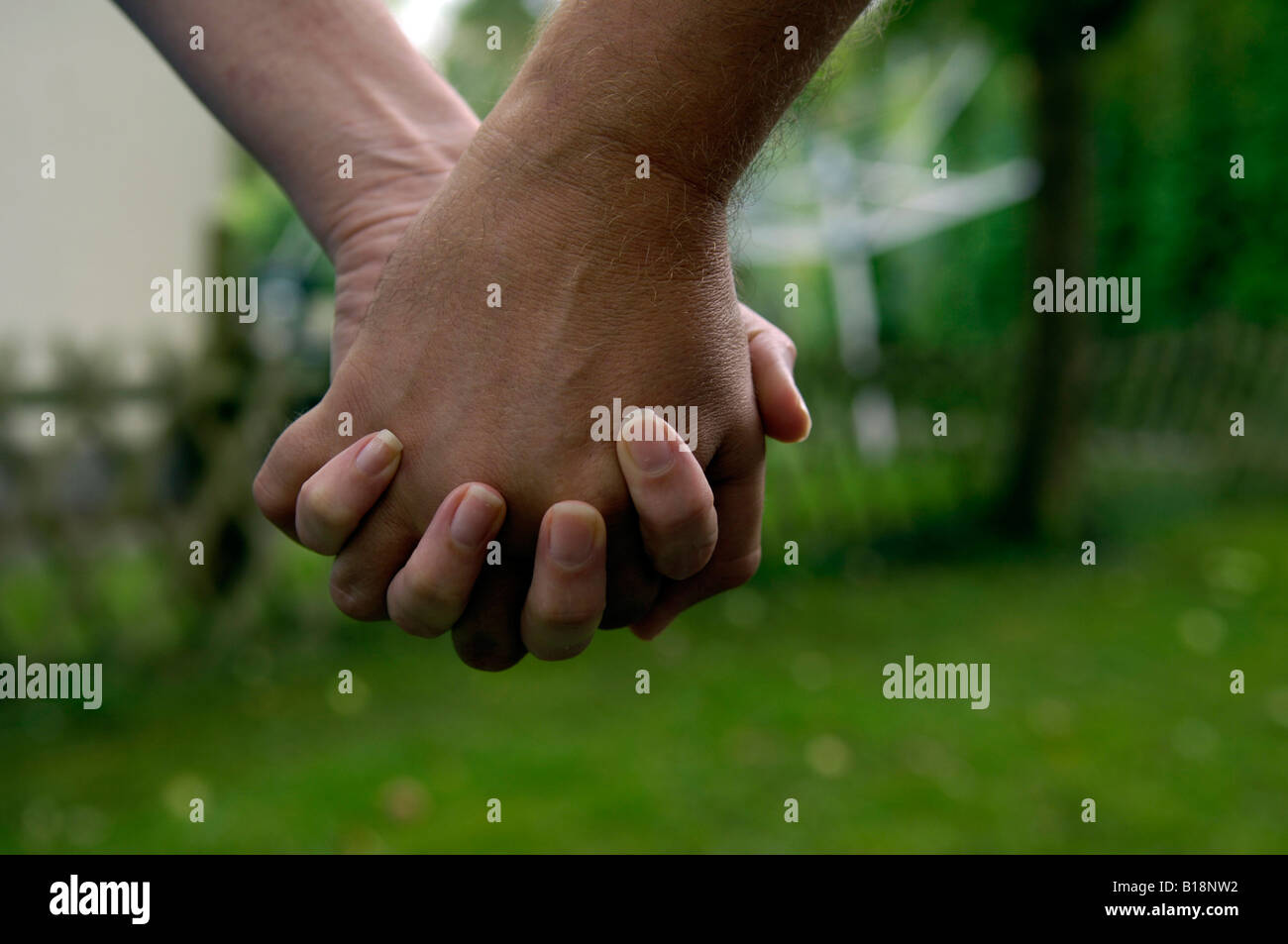 holding hands man woman couple love bond union together touch tactile ...