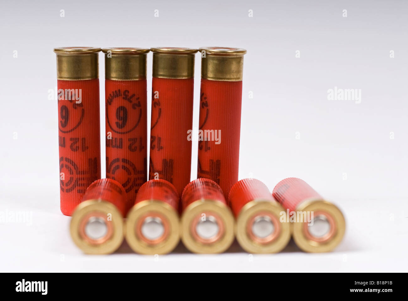 Stock photo of 12mm shotgun cartridges taken against a white background ...