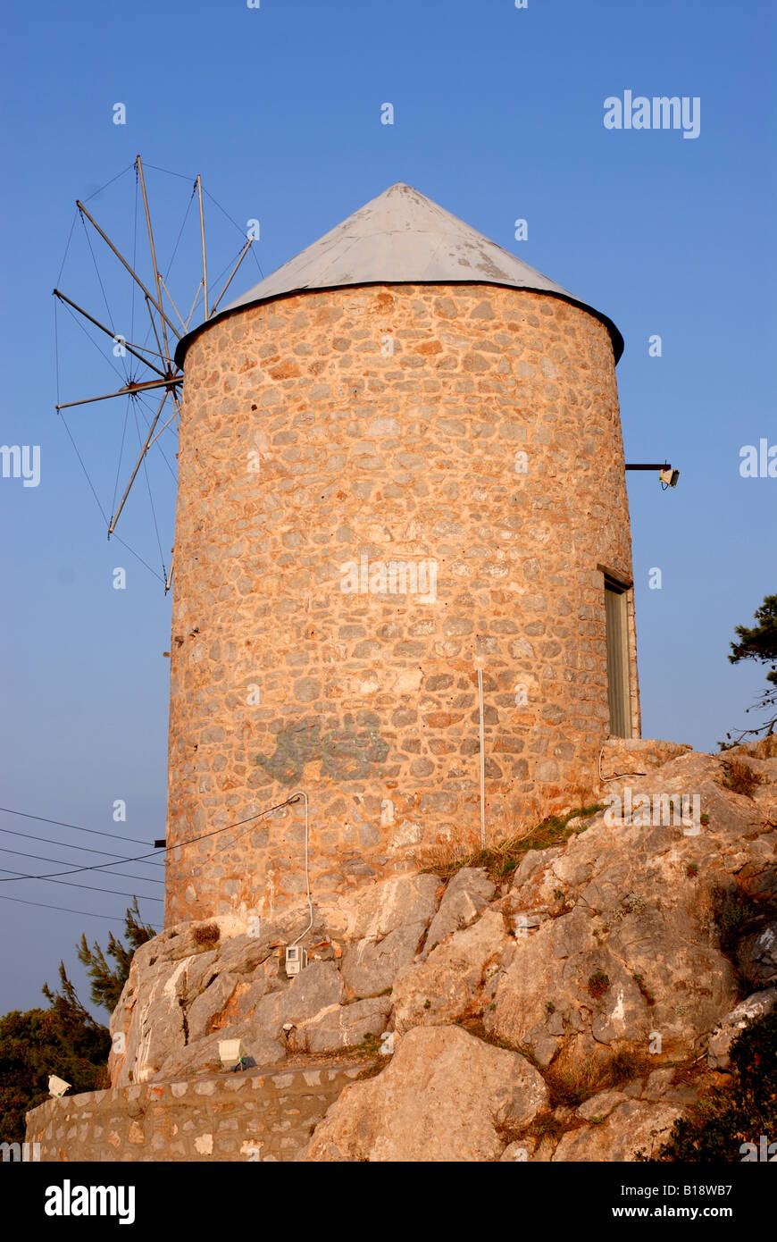 Old wind mill on the island of Hydra, Greece Stock Photo - Alamy