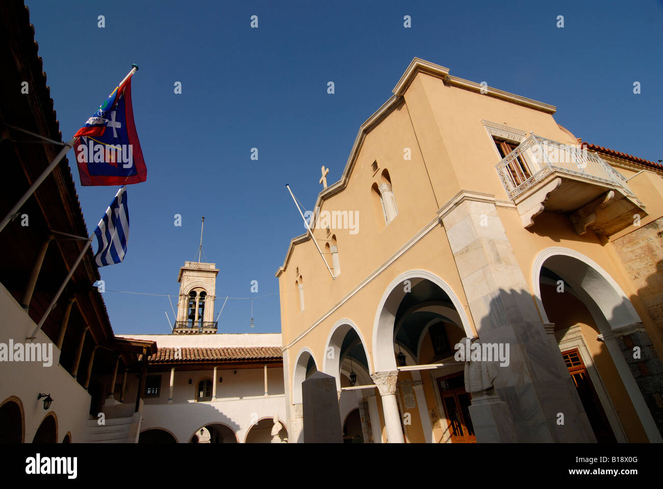 The clock tower and the byzantine museum in the habour of Hydra on ...