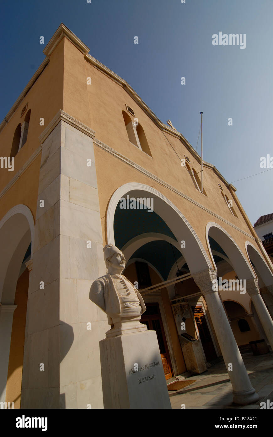 The clock tower and the byzantine museum in the habour of Hydra on ...