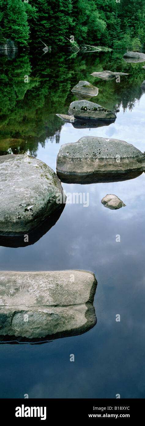 rocks and boulders in a lake, Val David, Quebec, Canada Stock Photo - Alamy