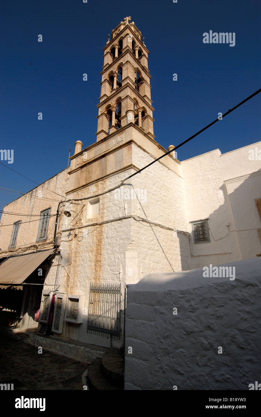 The clock tower and the byzantine museum in the habour of Hydra on ...