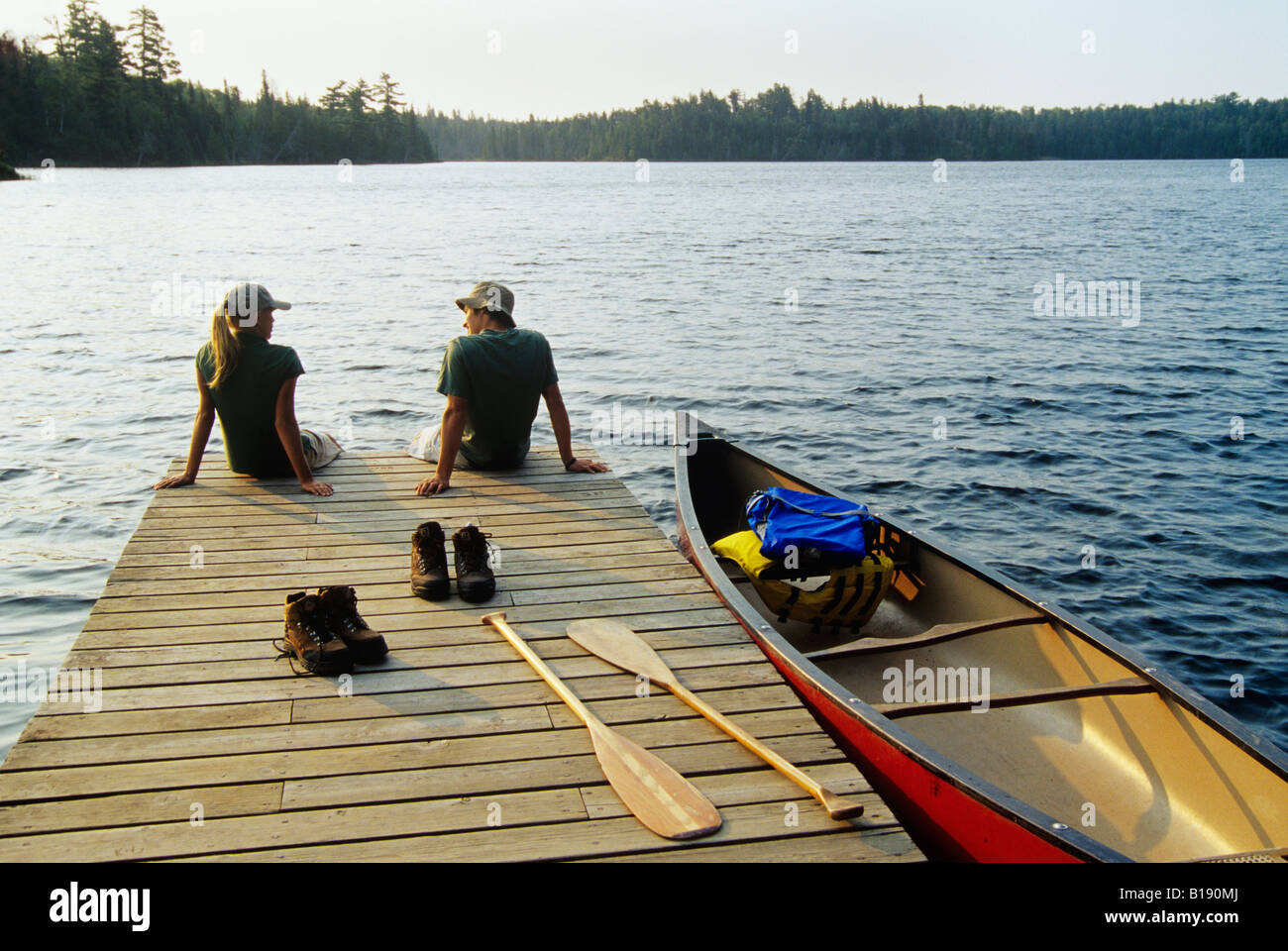 Teenagers on dock, Lyons Lakes, Whiteshell Provincial Park, Manitoba ...